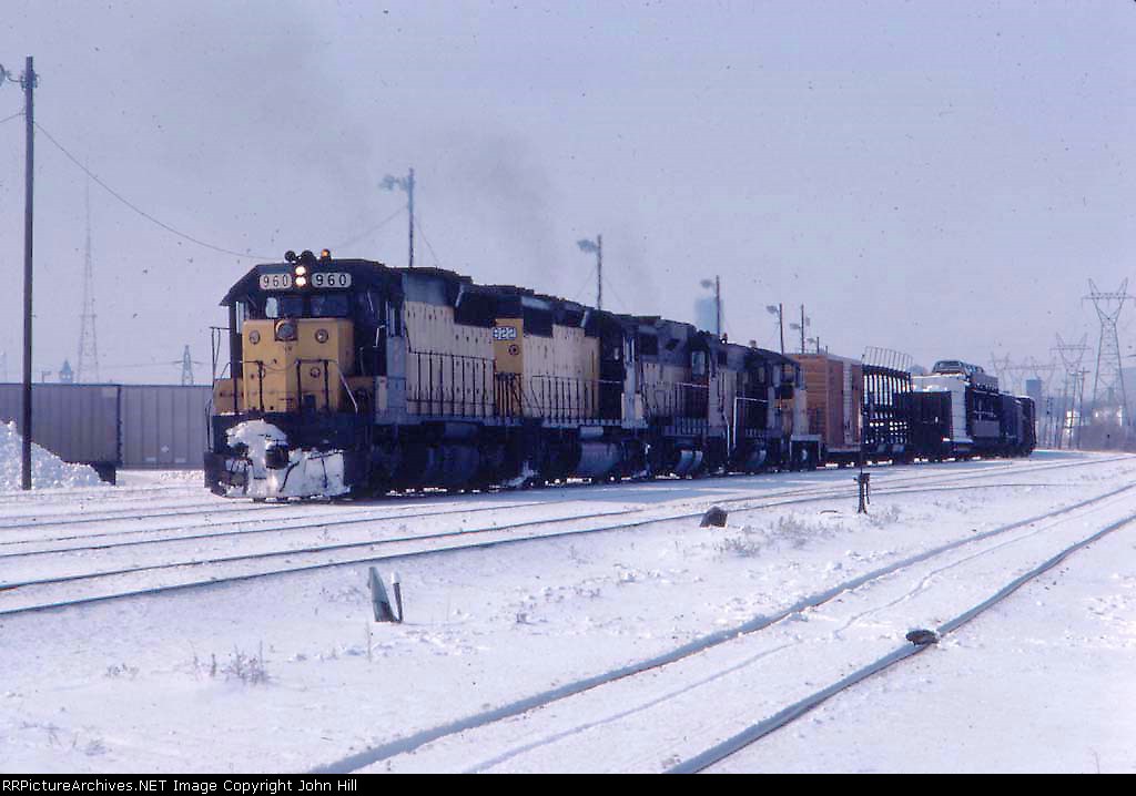 1037-02 Eastbound CNW freight on BN/GN freight main near Snelling Avenue